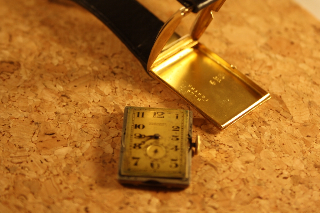 Movado Rectangular 18k gold wristwatch circa 1920's | Vintage Times