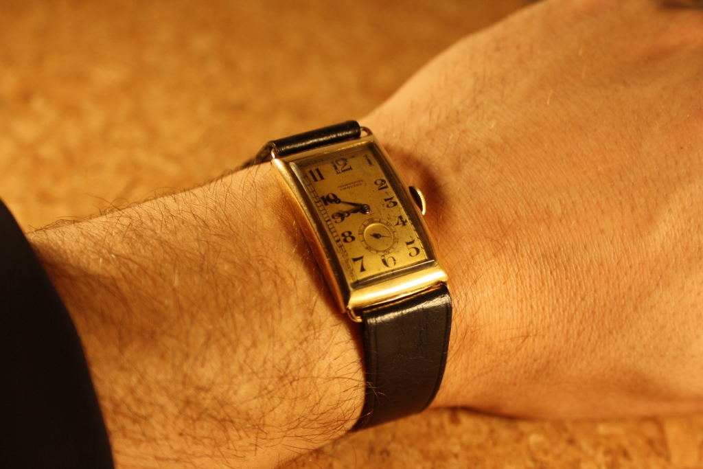 Movado Rectangular 18k gold wristwatch circa 1920's | Vintage Times