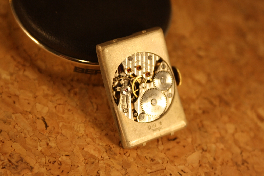 Movado Rectangular 18k gold wristwatch circa 1920's | Vintage Times