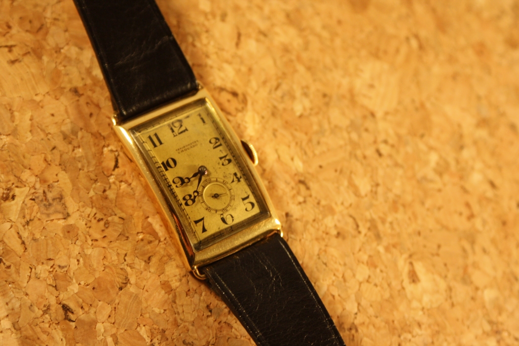 Movado Rectangular 18k gold wristwatch circa 1920's | Vintage Times