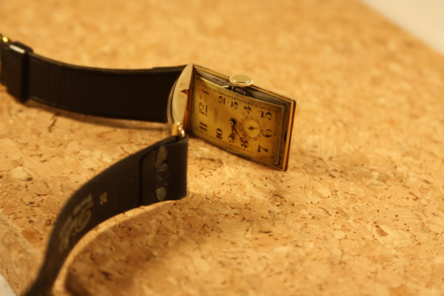 Movado Rectangular 18k gold wristwatch circa 1920's | Vintage Times