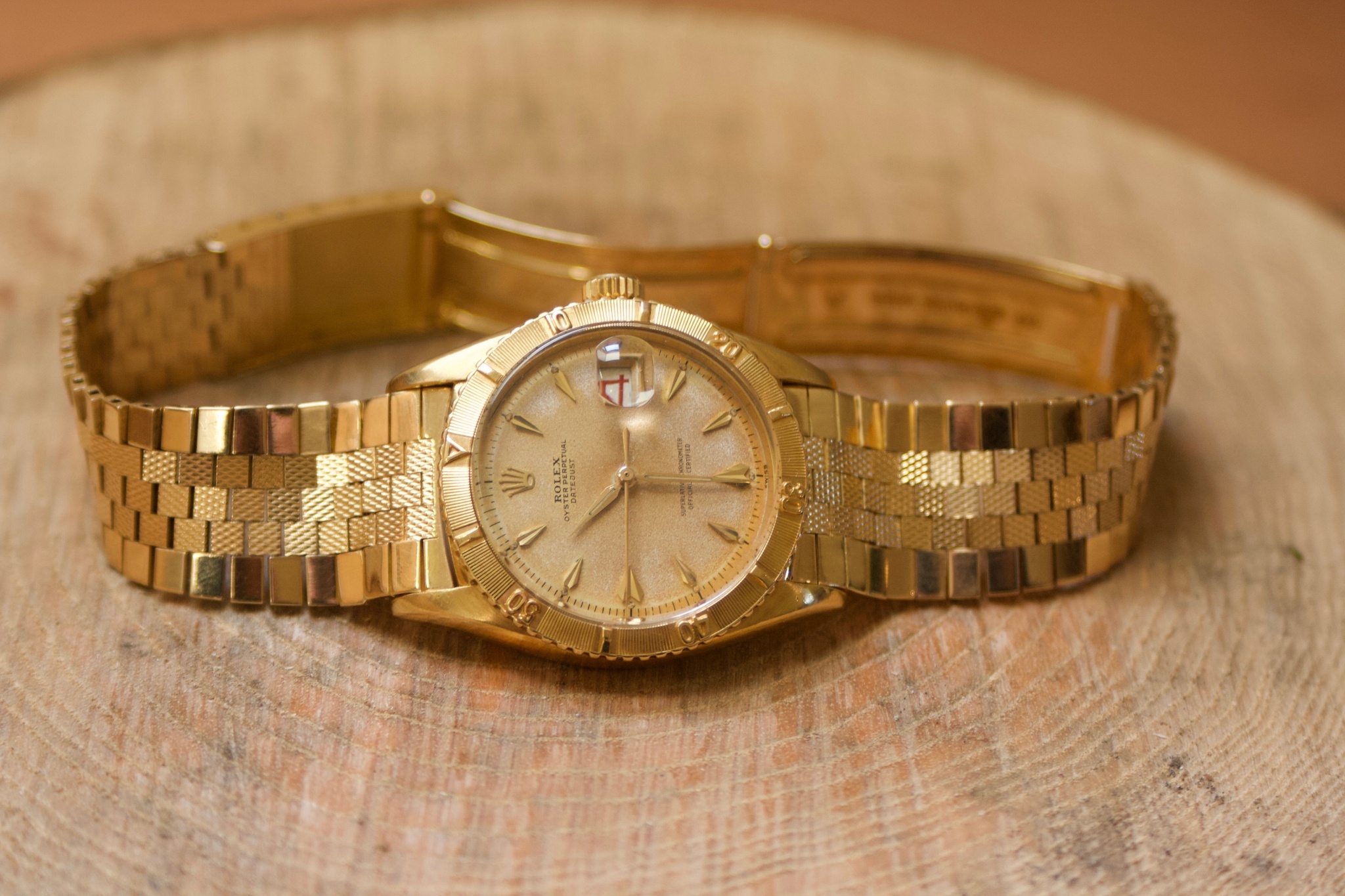 Rolex Thunderbird ref 6609 in yellow gold with a rare brick textured ...