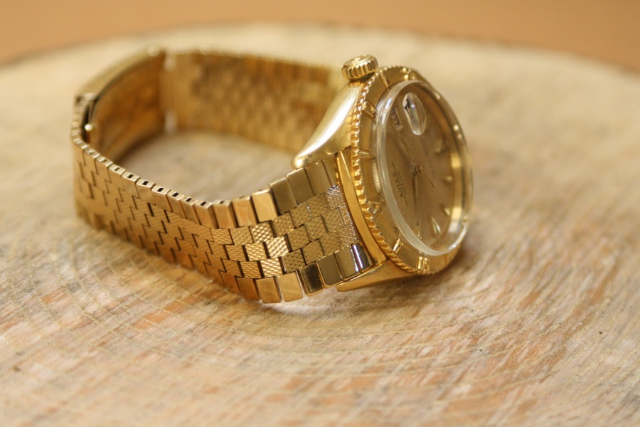Rolex Thunderbird ref 6609 in yellow gold with a rare brick textured ...