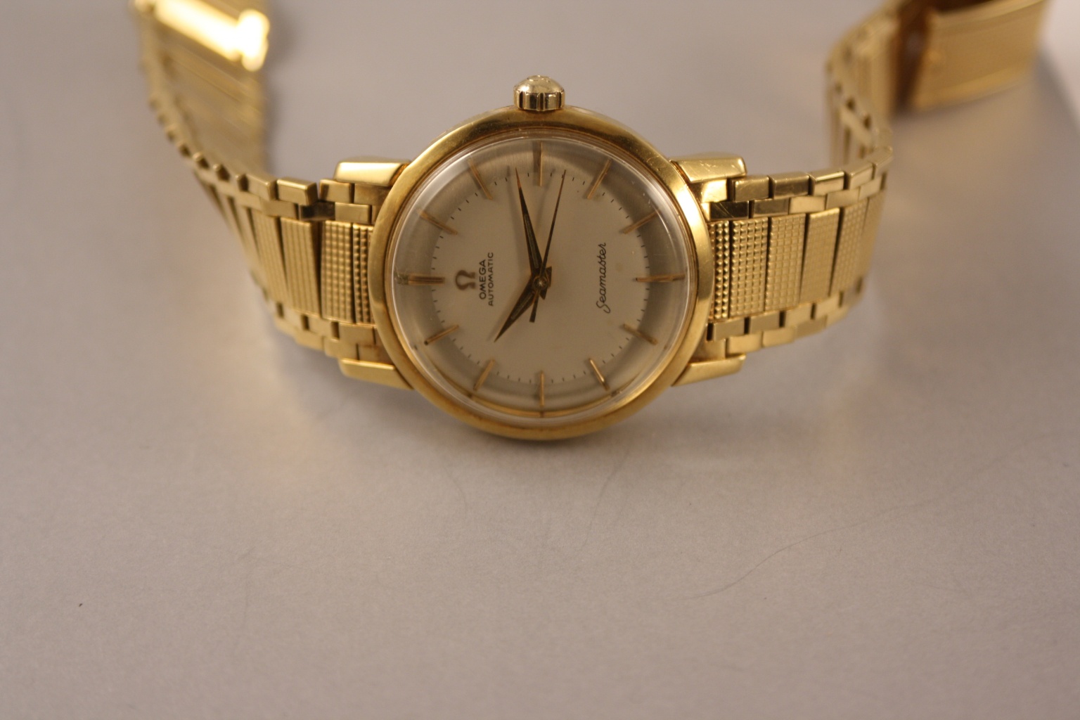 Rare Omega in yellow gold with integrated bracelet from the 1950's ...