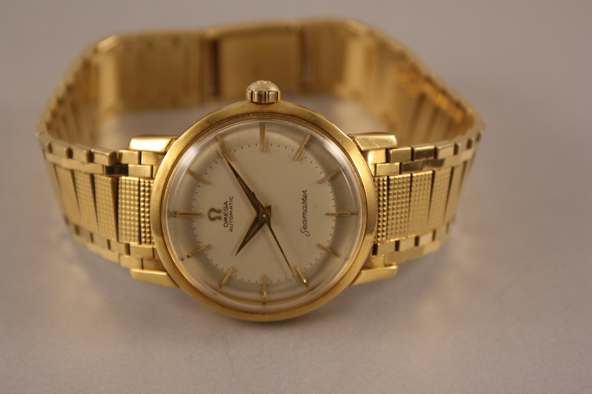 Rare Omega in yellow gold with integrated bracelet from the 1950's ...